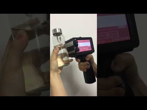 How to print graphic/ logo on the glass bottle surface? Handheld Portable Inkjet Code Printer