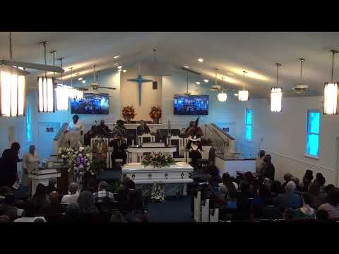 Delo and her sister Vicky singing Arlena Patrice Roper homegoing service at Greater Waltown UHC