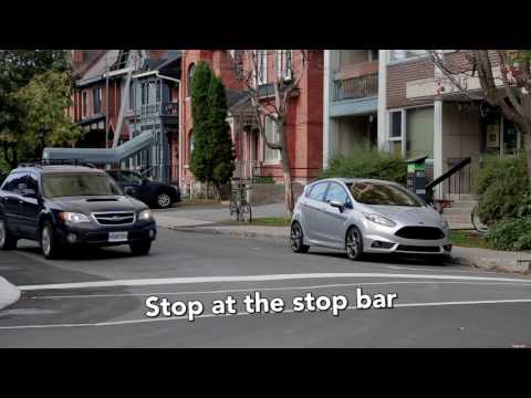 Ottawa motorists - how to pass through multi directional bike lanes