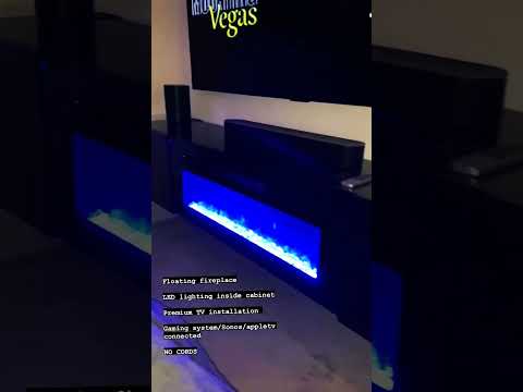 TV, surround sound, and floating fireplace installation. #lasvegas #TV #viral #diy