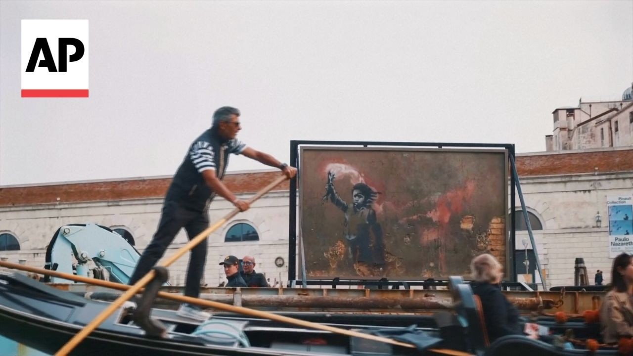 Banksy's 'The Migrant Child' tours Venice after restoration