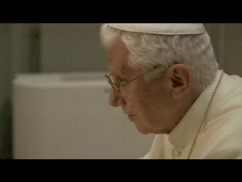 Brown shoes and a simple white cassock for a pope in retirement