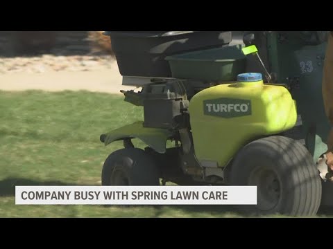 Landscaping business busy spreading pre-emergent this spring