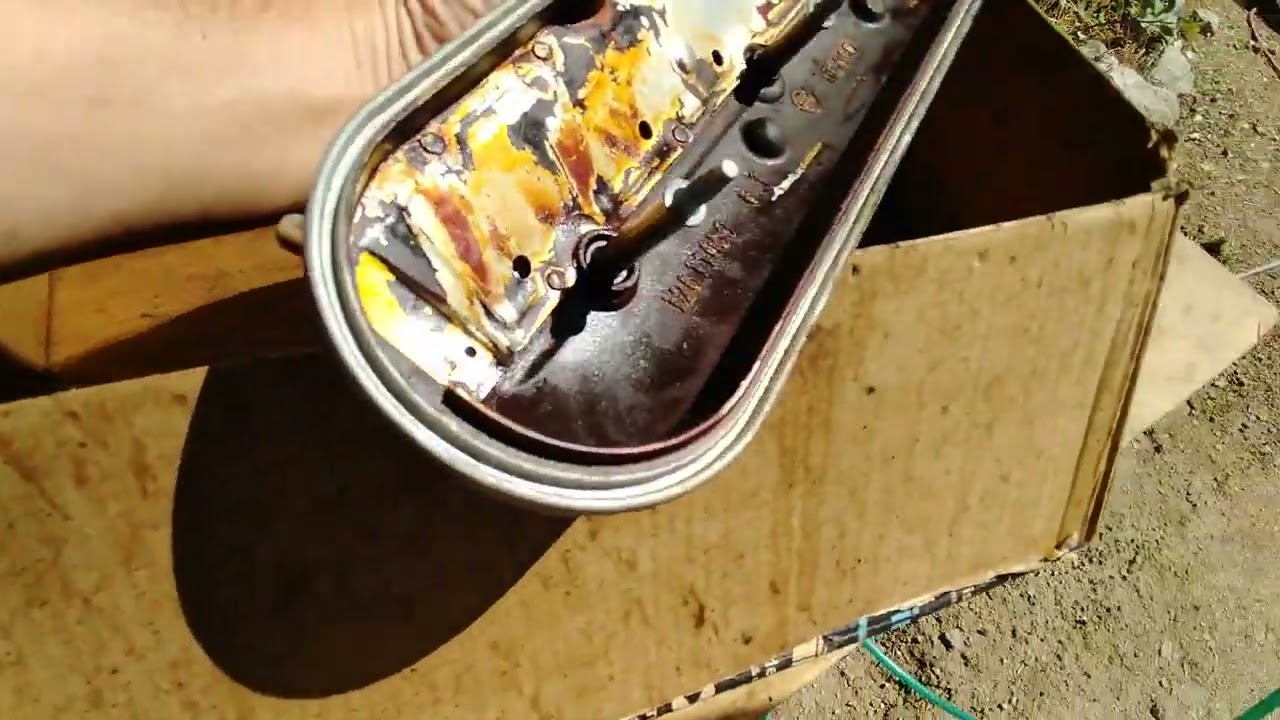 Chevy 5.3L Valve Cover cleaning and Super Modification for better oil drainage.
