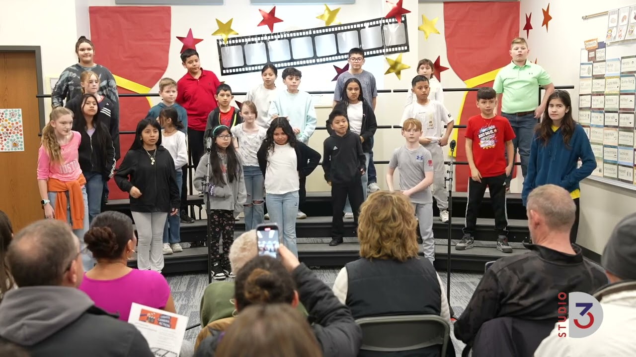 Mrs. T. Olson's 5th Grade Class Performing Lights Camera Action March 2025