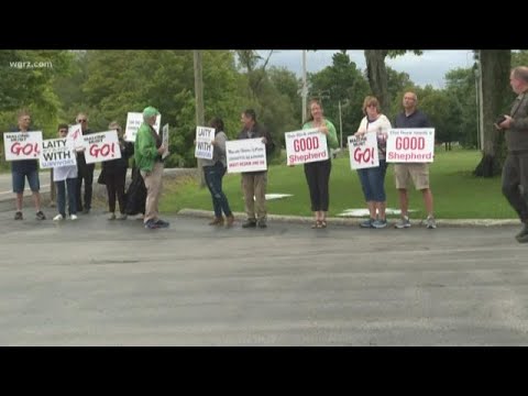 Protesters call for Bishop Malone to Resign