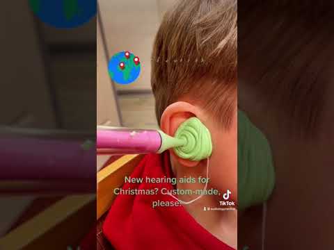 New hearing aids for the holidays, making a custom earmold for this young man:)