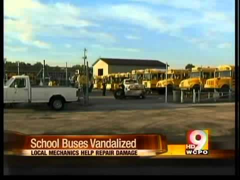 School buses damaged by golf balls