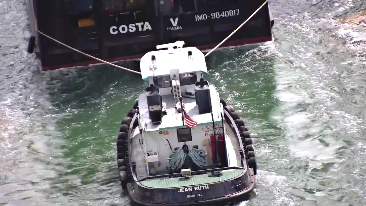 Tugboats With Supply Ship