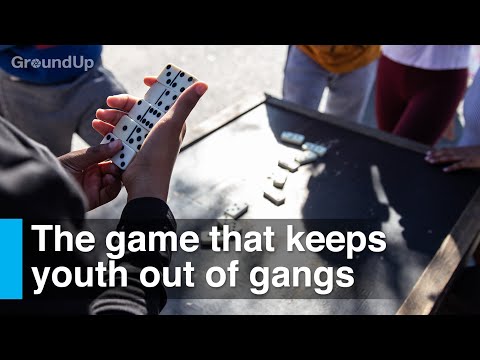 Kalib Missoe runs an after school dominoes club in Belhar, Cape Town