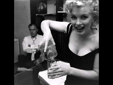 Marilyn Monroe with Arthur and producer Kermit Bloomgarden in their NYC apartment 1958. By R Kelly