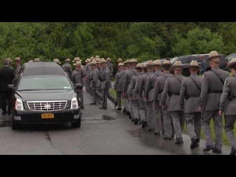 Hundreds of law enforcement officials mourn fallen trooper