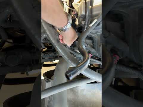 2009 Ram 5.7 camshaft position sensor location. Passenger side directly behind top heater hose.
