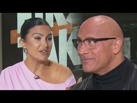 Dwayne “The Rock” Johnson Gives His Ring To A Surprised TV Host - Mix 103.1