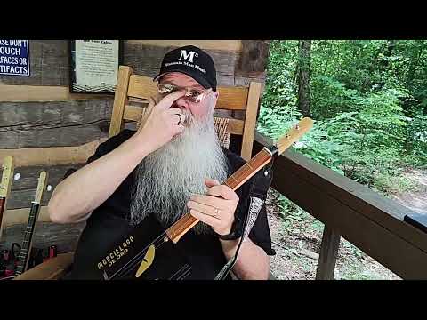 Demonstration of "canjo" & cigar box guitar