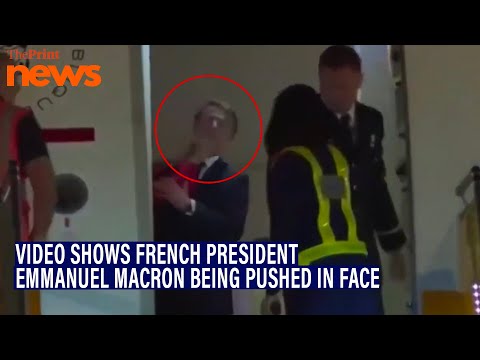 Video shows French President Emmanuel Macron being pushed in face after his plane lands in Vietnam