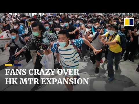 Hong Kong railfans flock to take first train of new cross-harbour rail