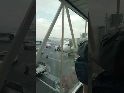cdmx airport airplane sky bridge crossing boarding