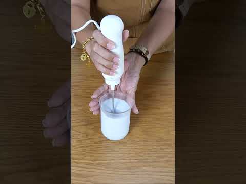 Make your coffee cream or cold milk foam using a handheld milk frother
