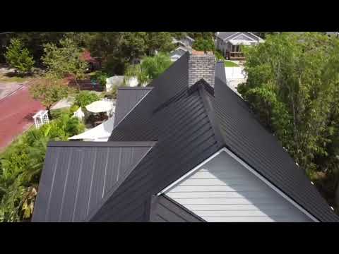 🏡✨ Check out this stunning Matte Black Metal Roof! ✨🏡