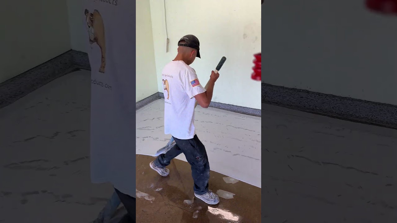 Squeegee Epoxy all over #satisfying #construction #epoxyfloor