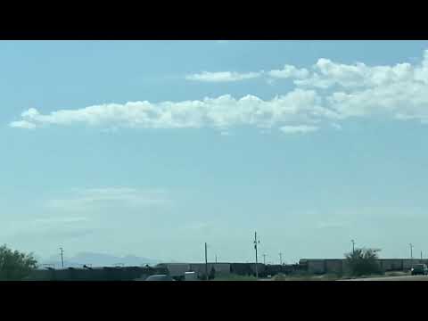Westbound train Passes Red Rock with UP 1105 and 1035