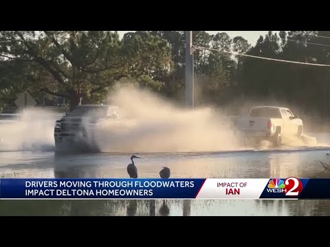 Drivers moving through floodwaters impact Deltona homeowners