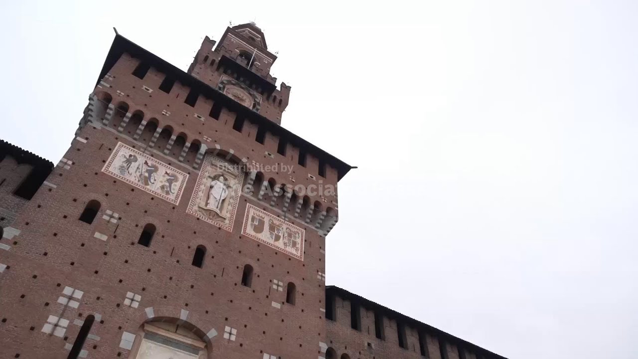AP reporter attends Milan's daily pin hunt that has Olympic collectors running to landmarks