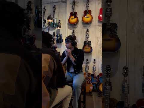 recording guitars at a guitar store