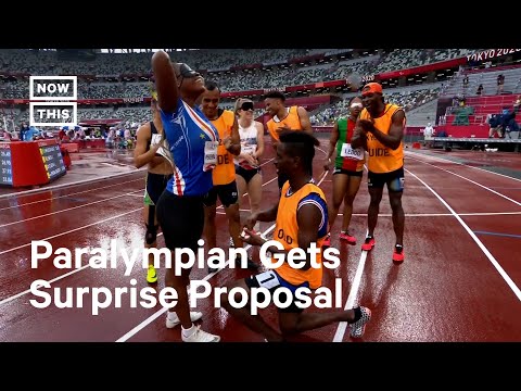 Guide Proposes to Paralympic Runner at Finish Line