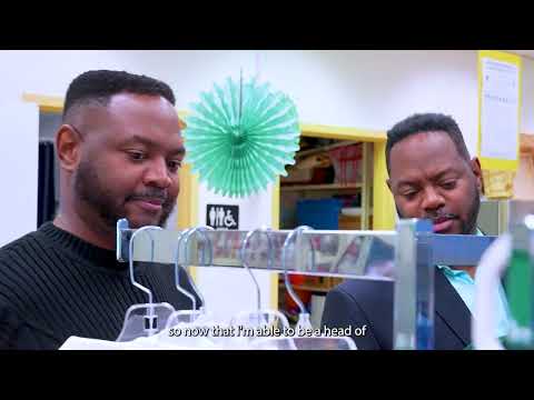 Principal of Toussaint L'Ouverture and His Twin Spearhead Community Effort Close to Their Hearts