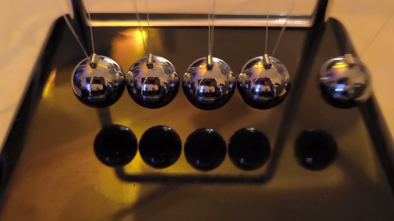 Newtons Cradle (pendulum balls) #balance #physics  #harmony