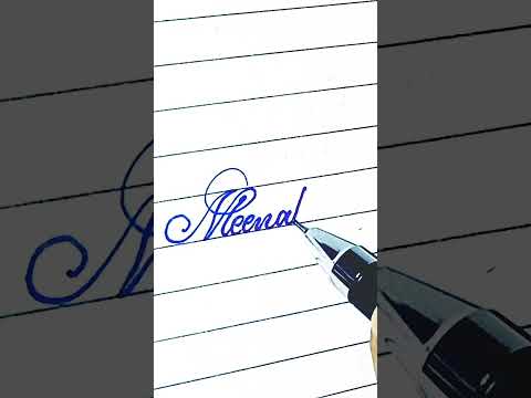 writing a name "Meenakshi" in cursive #shorts