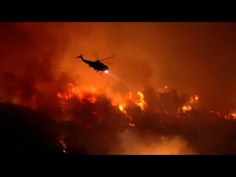 Firefighters battle Auto Fire near Los Angeles  | VOA News