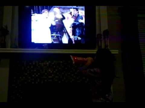 Mack cracking up at Adam Sandler and Chris Farley performing Lunch Lady Land