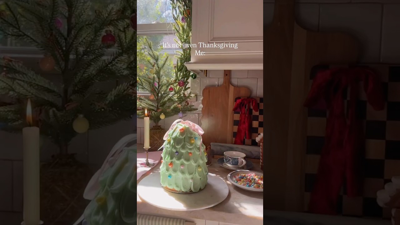 Whimsy Christmas tree cake ✨ All I used was 2 boxes of cake mix, pre made icing, sprinkles, and