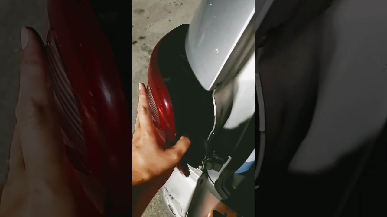 Remove brake light/turn signal bulb. Replace with new bulb. Installation is reverse of removal