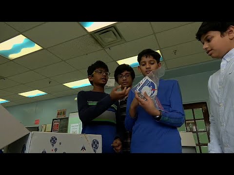 4 Meyzeek Middle School students working on project with NASA