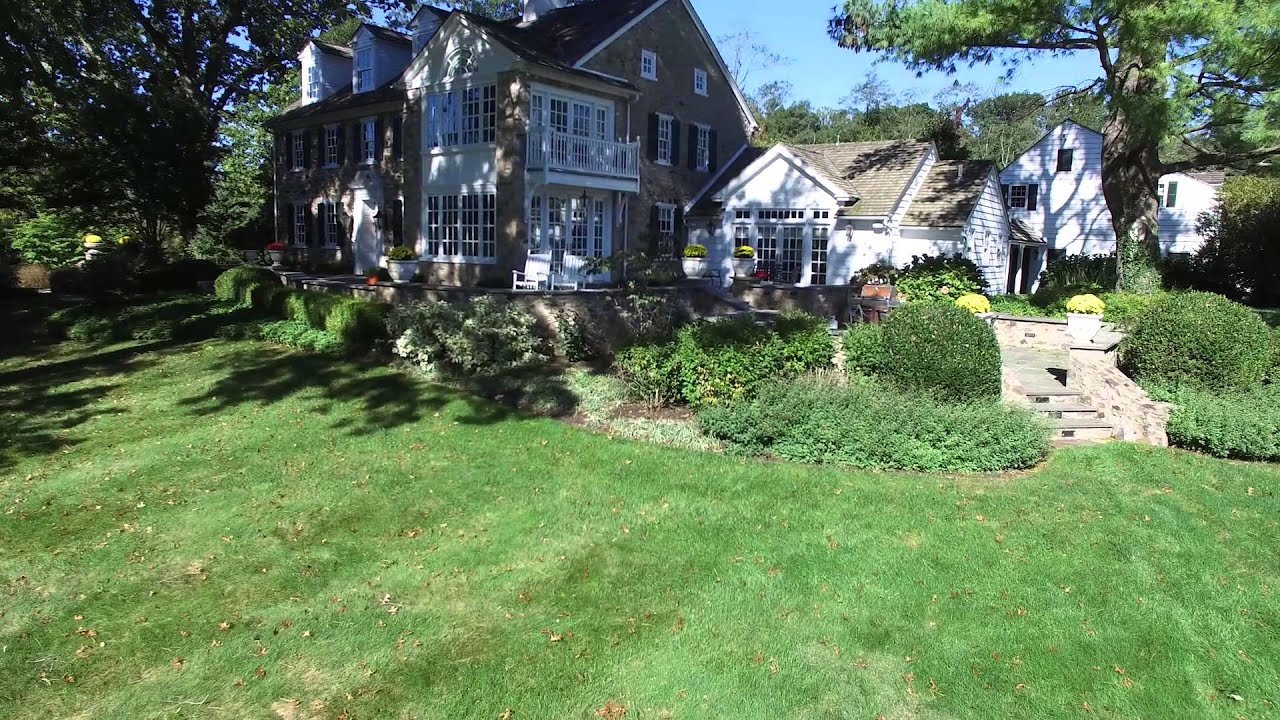 Stillwater Landscape Associates | A colonial home's landscape, patios and pool from above