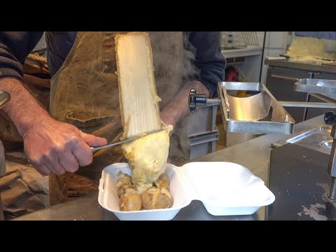 Yummy Raclette of Melted Swiss Cheese. London Street Food