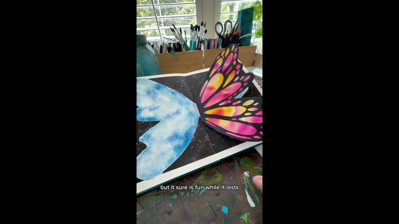 Interactive butterfly sketchbook page