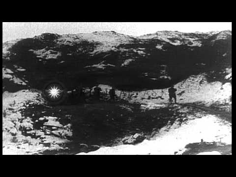 Men walk on the destroyed battlefield at Fleury, Douaumont near Verdun, France. HD Stock Footage