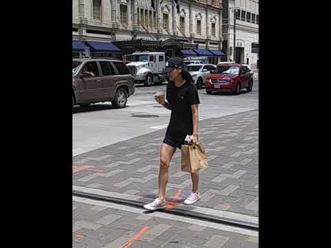 WOMAN WALKING WITH COFFEE IN HER HAND-ACTIVE WOMEN SERIES