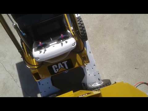 Cat loader 1/5 scale, Cat truck 797B 1/25 scale and 1/14 king hauler semi truck.