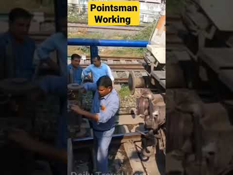 ASSISTANT POINTSMAN ON DUTY WORK IN INDIAN RAILWAY TRAIN SHUNTING