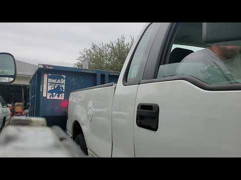 1/2 ton F150 moves Roll-off Dumpster
