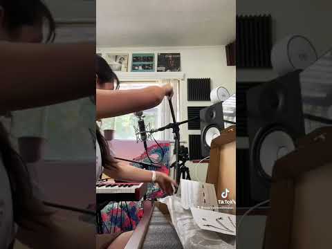 I tested and tried a microphone stand that attaches to a desk (from Amazon)