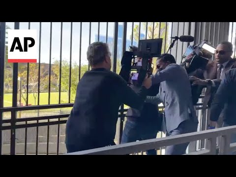 WATCH: A$AP Rocky pushes past media to enter courthouse for trial