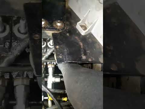Cat.428E steering hose location