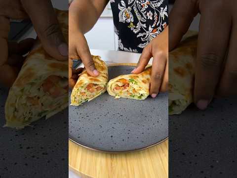 My African friend from Uganda taught me this recipe. #shortsafrica #shorts #africanfood #rolex